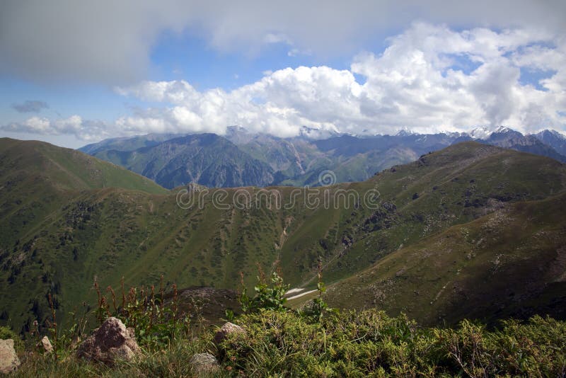 Clouds over the mountains. stock image. Image of blue - 136056223