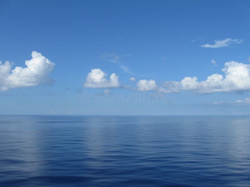 Clouds over the Ocean stock image. Image of people, years - 74661199