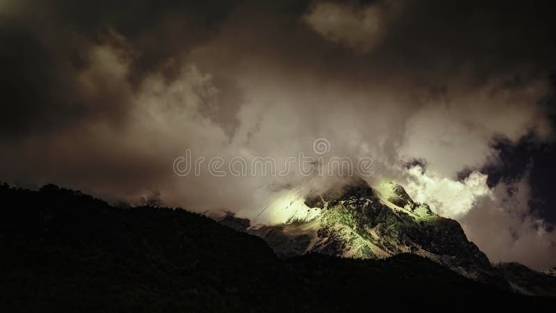 Clouds over the peak stock photo. Image of screenshot - 229213514