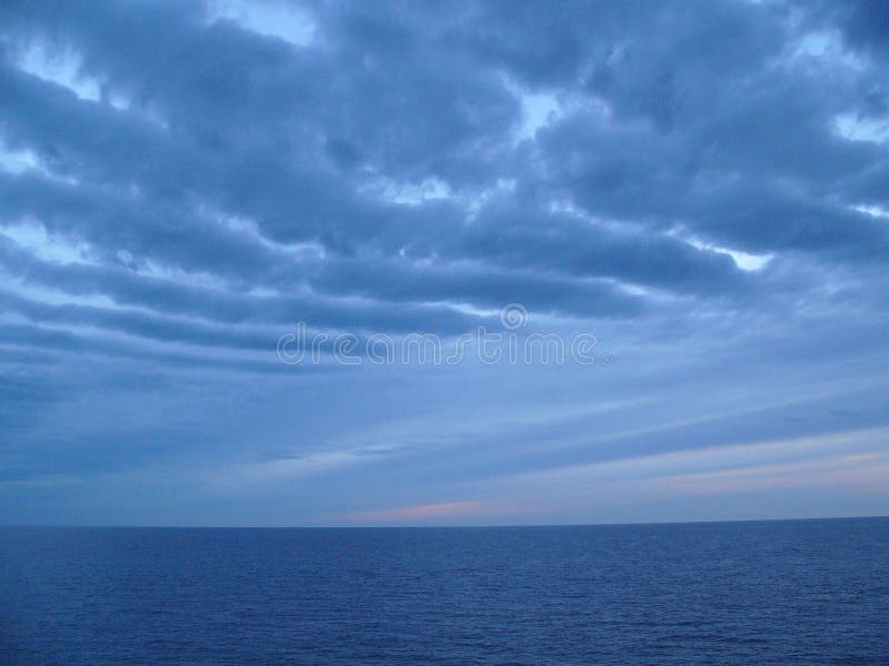 Clouds Over the Sea, Layered Clouds, Sunset, Breeze Stock Image - Image ...