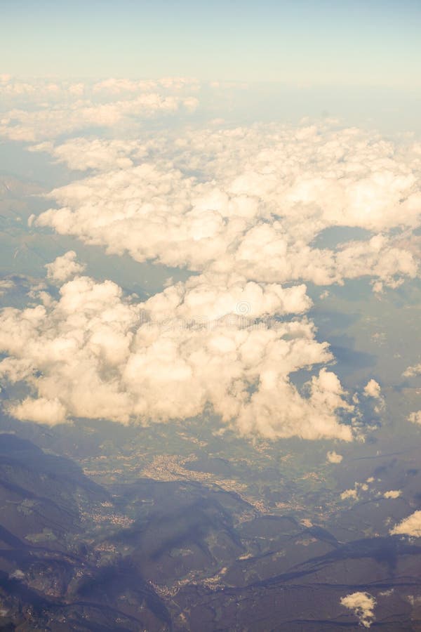 Clouds Over Snow Clad Austrian Alps Mountains Seen from an Airplane ...