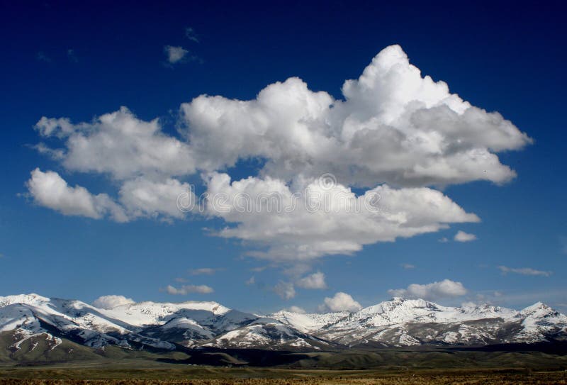 Clouds Over Snowy Ruby Mountains Stock Image - Image of elko, clouds ...