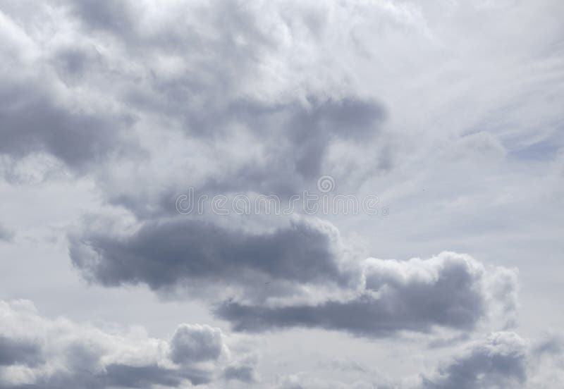 Clouds Part To Reveal Sun Shining Over Mountain in Purple Dusk Stock ...