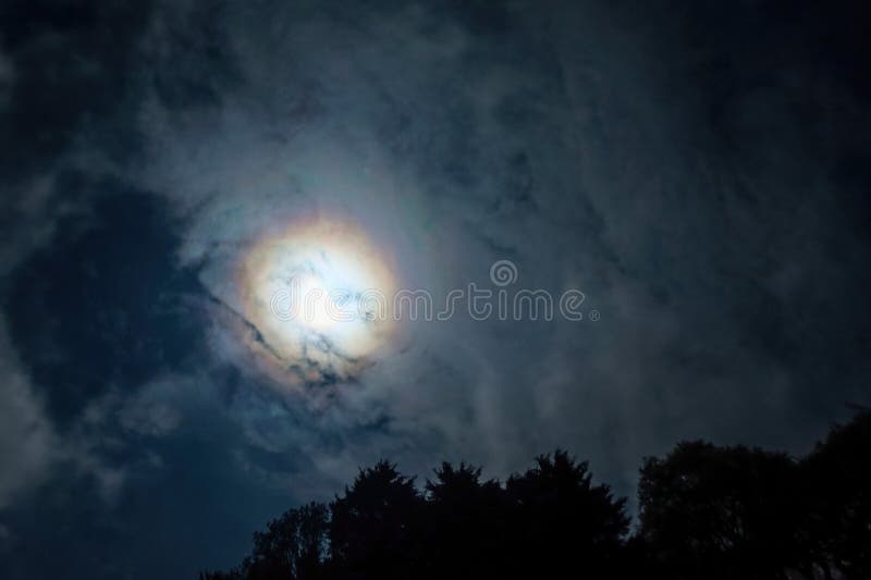 Clouds Pass in Front of the Moon in a Night Sky Stock Image - Image of ...