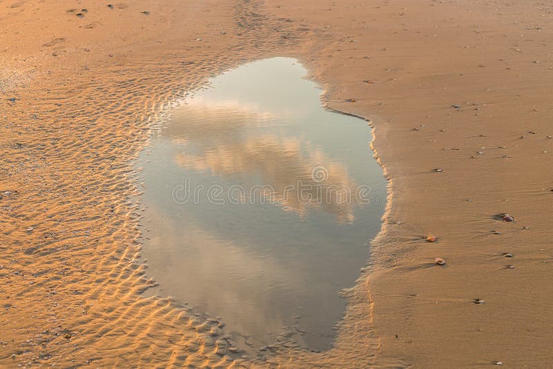 Clouds in Puddle on the Beach Stock Photo - Image of sunset, puddle ...