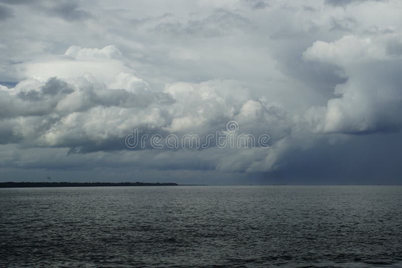 Clouds and Rain Over Ocean by Cebu Island Stock Photo - Image of midway ...