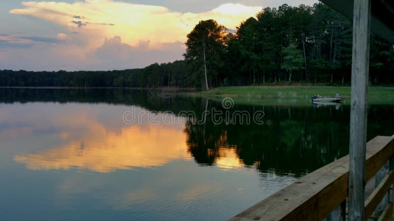 Sunset from the Boat dock stock photo. Image of waters - 105363664