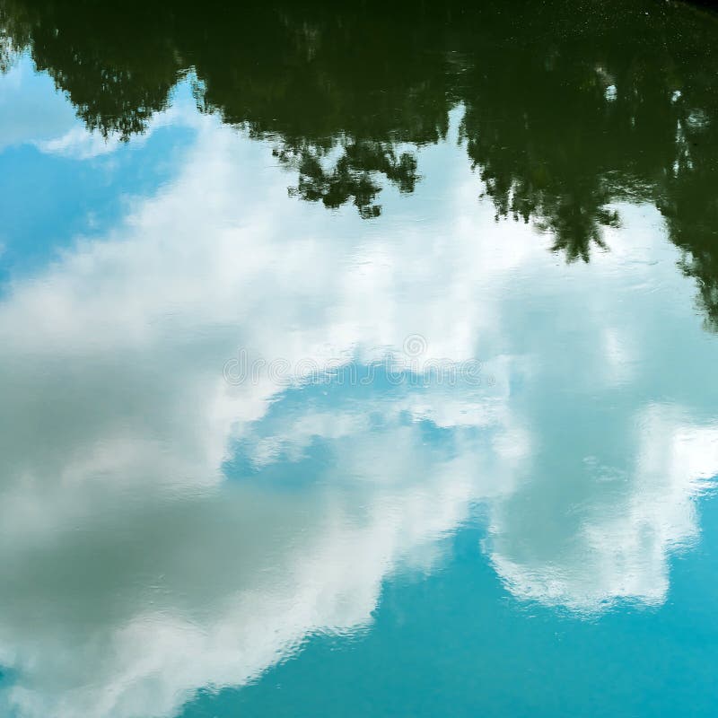 Clouds are Reflected on the Water Surface in Louangphabang, Laos. Close ...