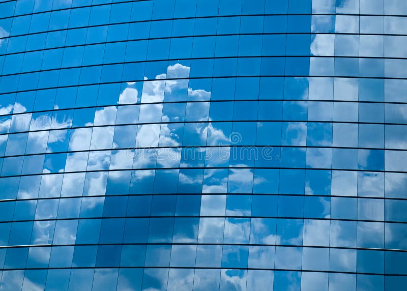Clouds reflected in windows - Stock Image - Everypixel