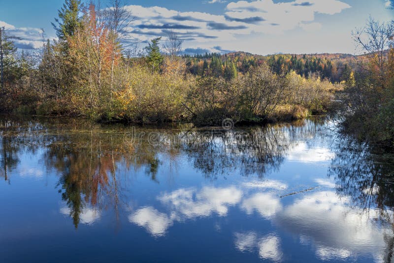 Clouds Reflections at Nord Swamp, Marais Du Nord, Park. Quebec. Canada ...
