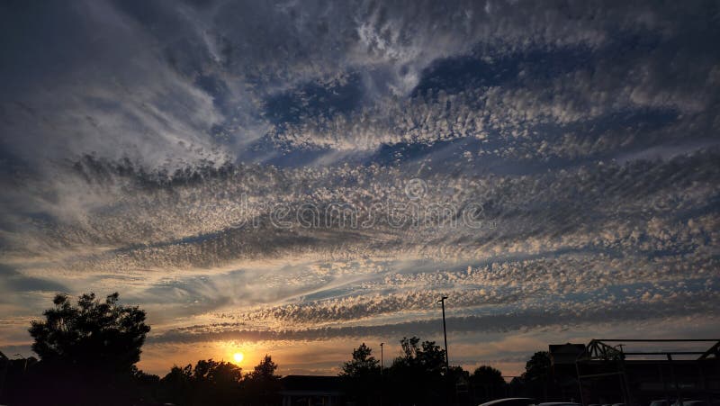 Clouds Running Towards Setting Sun Stock Photo - Image of evening ...