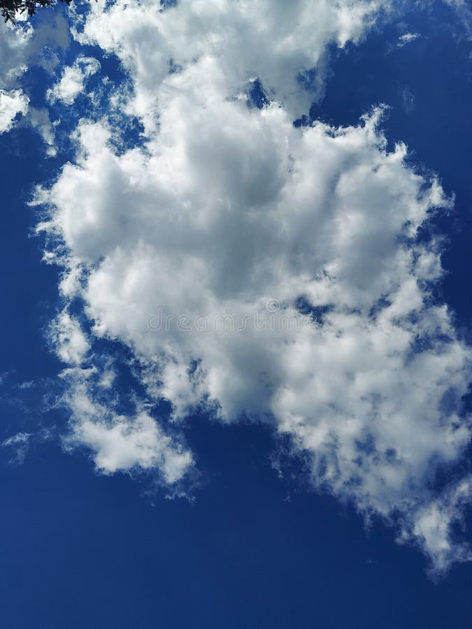 Clouds Shaped Like a Cross stock photo. Image of daytime - 255321872