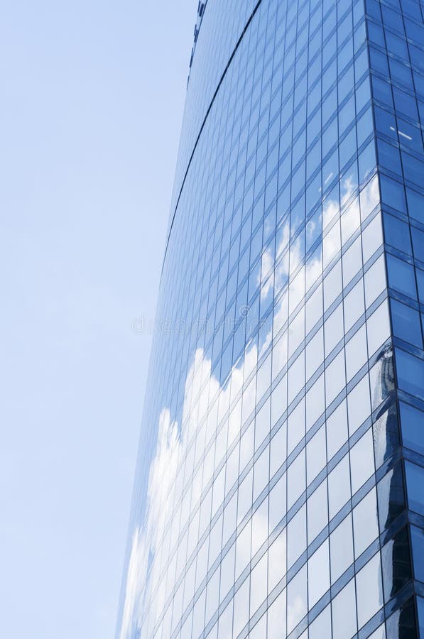 Reflections of Clouds in Windows of a Skyscraper Stock Photo - Image of ...