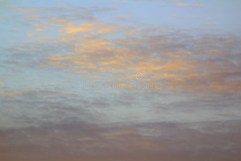 Clouds in the Sky are Illuminated from Below by the Red Light of the ...