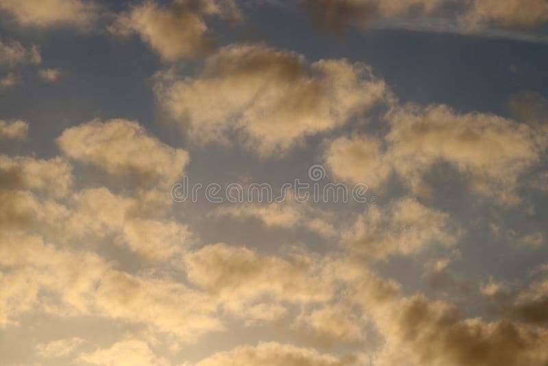 Clouds in Sky Lit from Below by Setting Sun Stock Photo - Image of ...