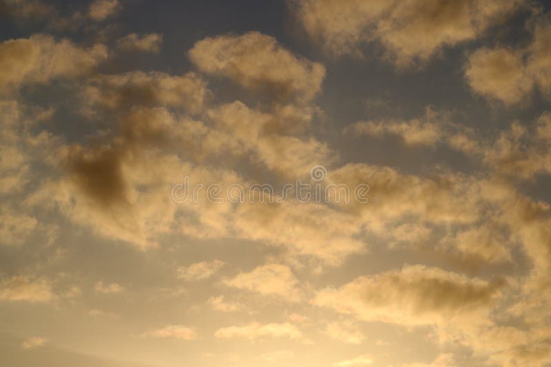 Clouds in Sky Lit from Below by Setting Sun Stock Photo - Image of ...
