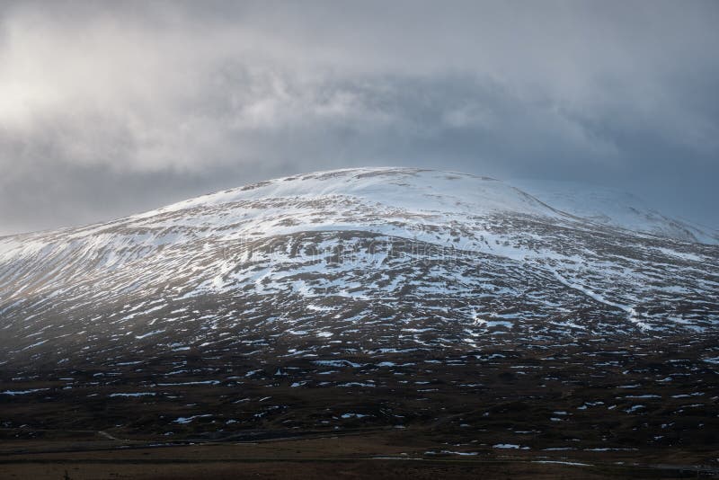 A Clouds and Snow Mountain in the Scottish Highlands Stock Photo ...