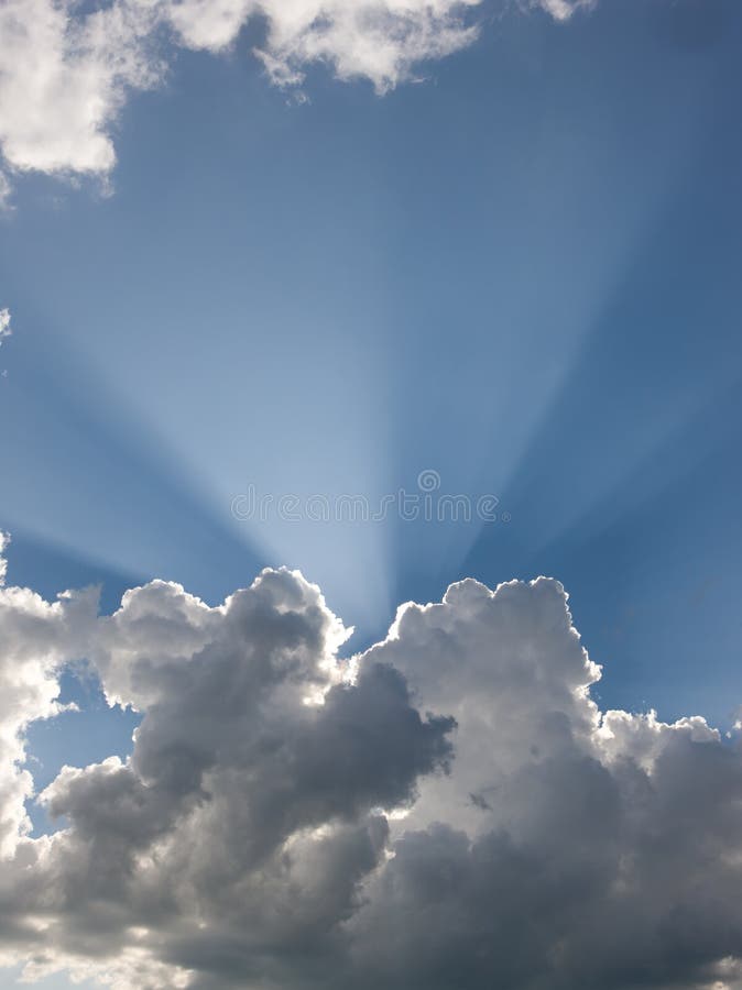 Clouds and sun rays stock photo. Image of immensity, overhead - 5619496