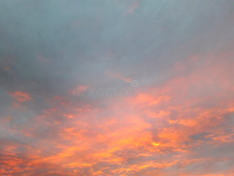 Clouds in sunset stock image. Image of dawn, reflection - 231748655