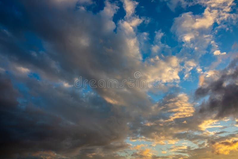 Clouds at Sunset. Partly Cloudy Sky with Orange Clouds Stock Photo ...
