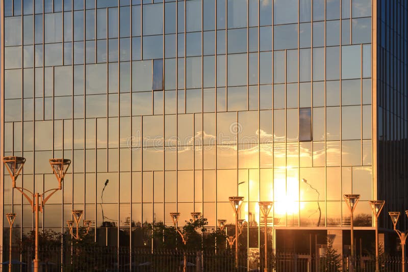Clouds and Sunset Reflection in Glass Office Building Stock Image ...