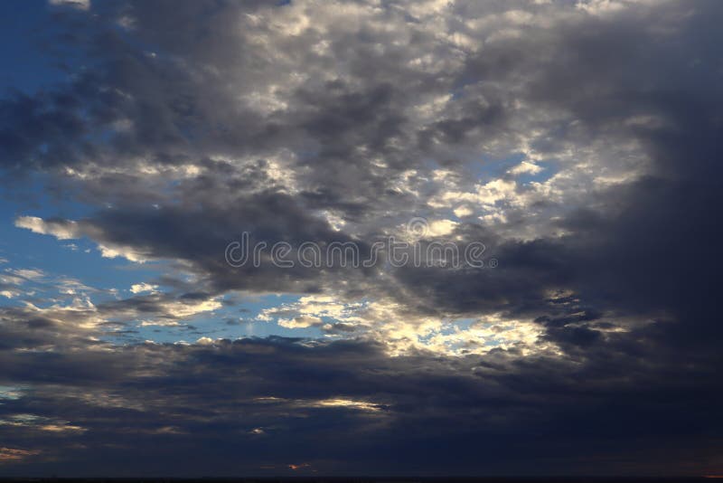 Clouds at Sunset with Sunny Spells Stock Photo - Image of color ...