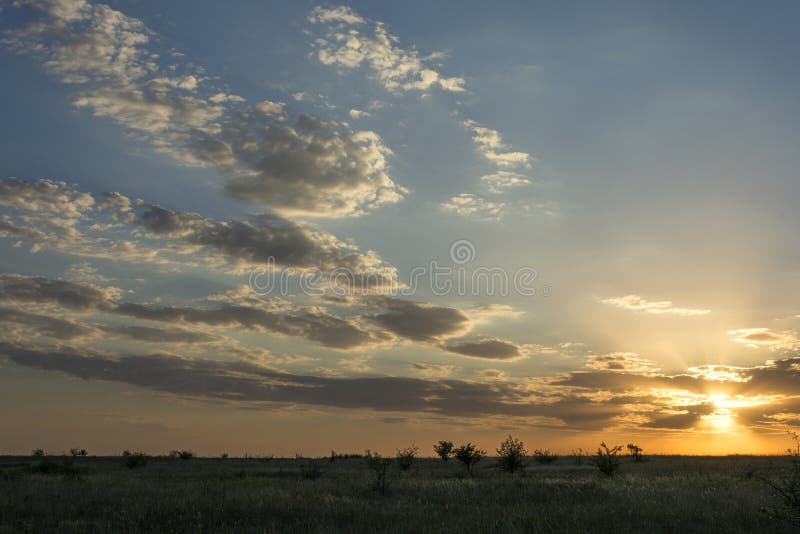 Clouds surround the sun stock photo. Image of backgrounds - 100983942
