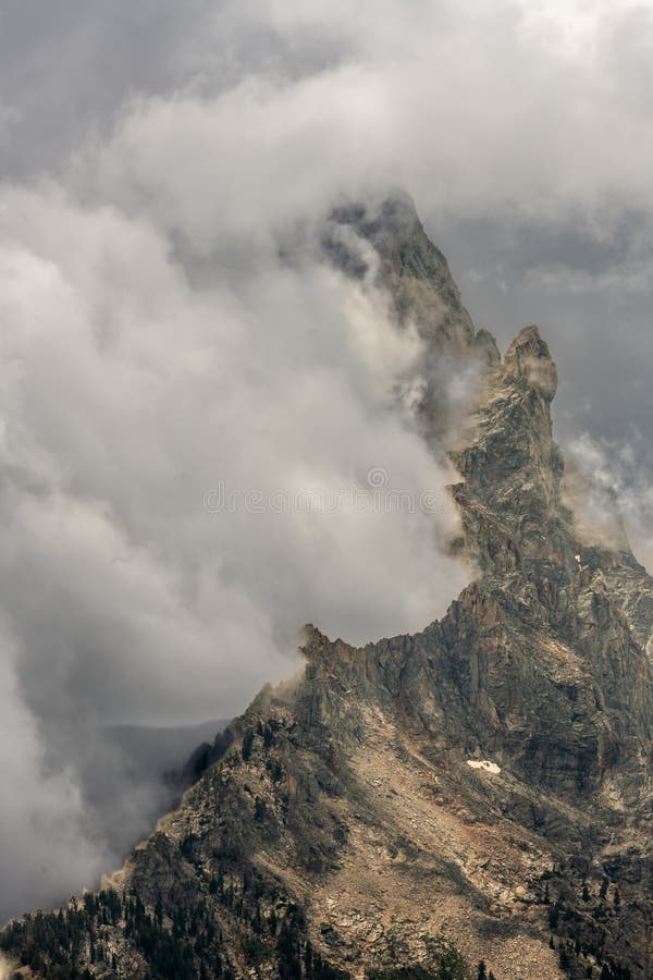 Clouds Swirl Around the Jagged Ridges of Grand Teton Stock Image ...
