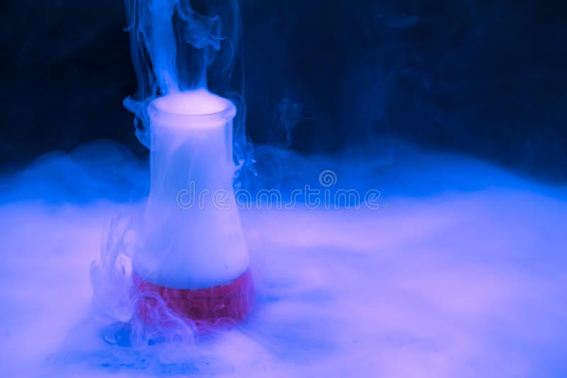 Clouds of Thick Smoke Pouring from a Chemical Flask Stock Photo - Image ...