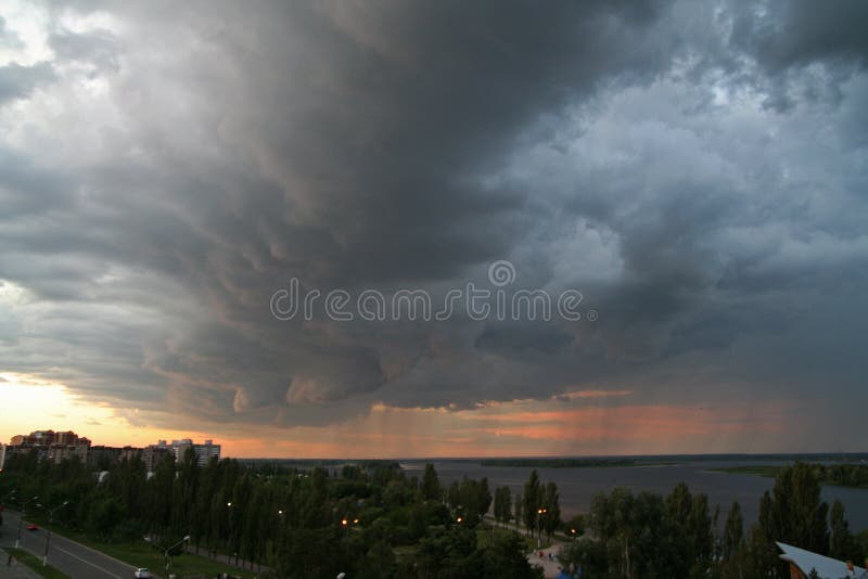 Clouds before Thunder and Rain Over the City and the River Stock Photo ...