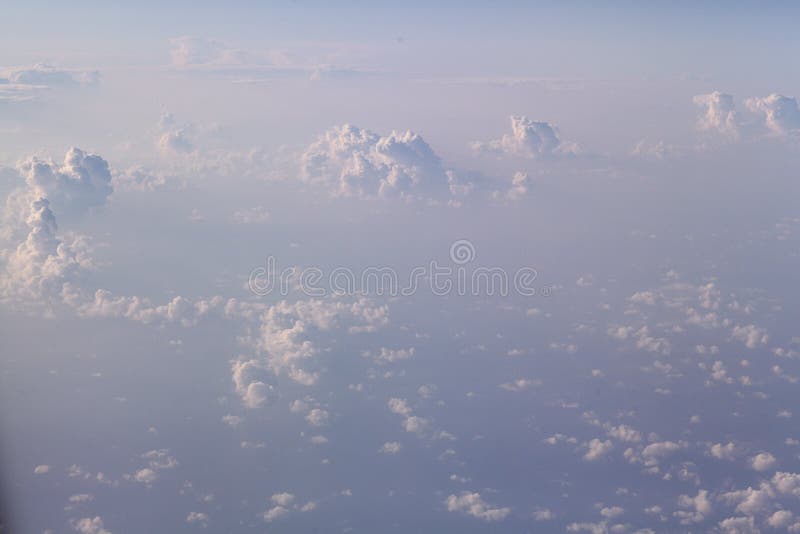 Clouds view from the plane stock photo. Image of space - 59931530