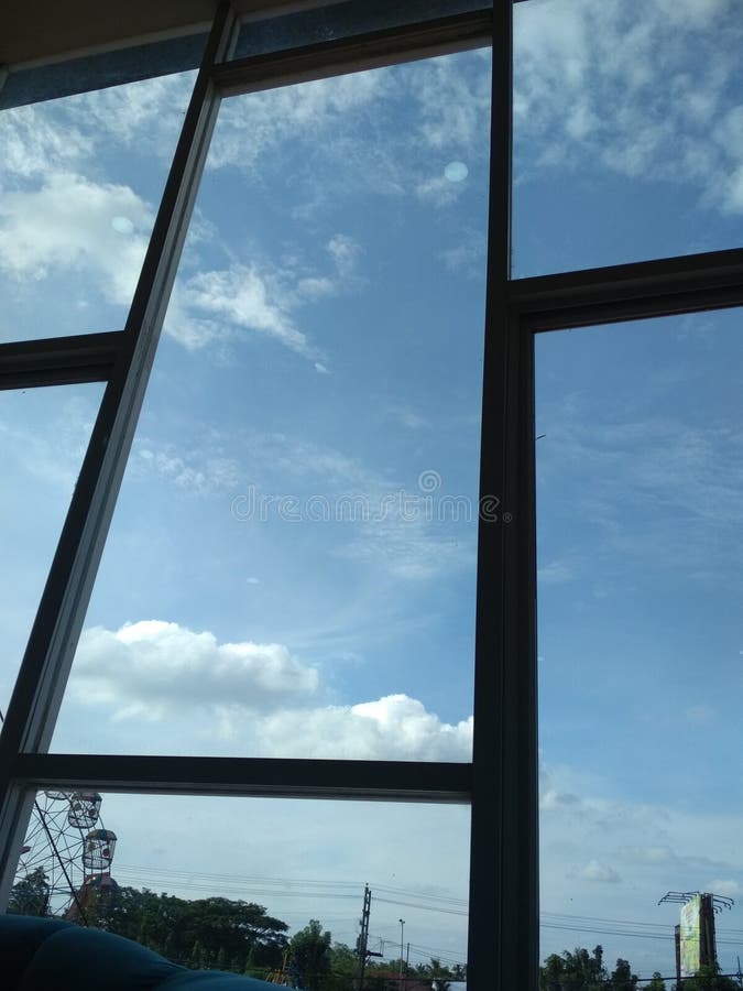 Clouds Visible from the Glass Window Stock Photo - Image of arch ...