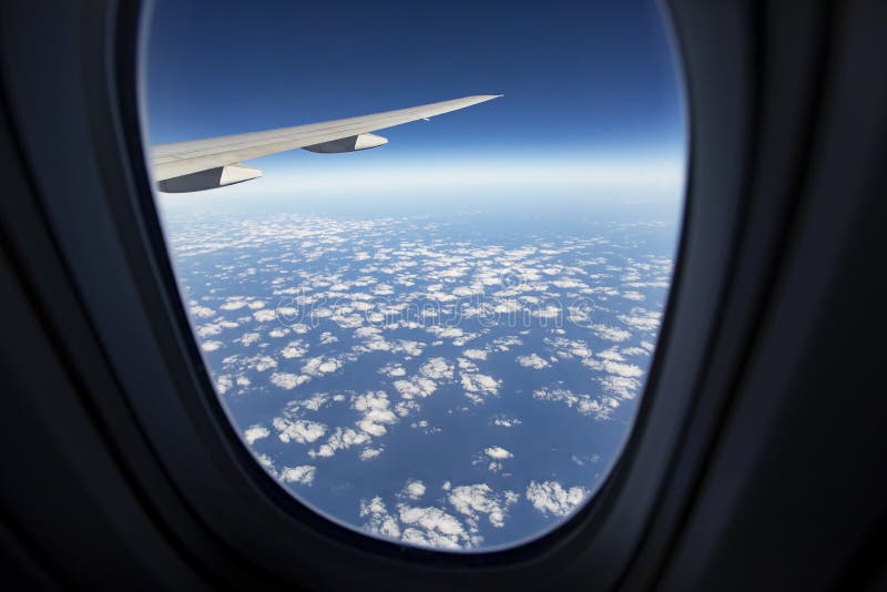 Cloudscape Against Blue Sky through Air Plane Window Stock Image ...