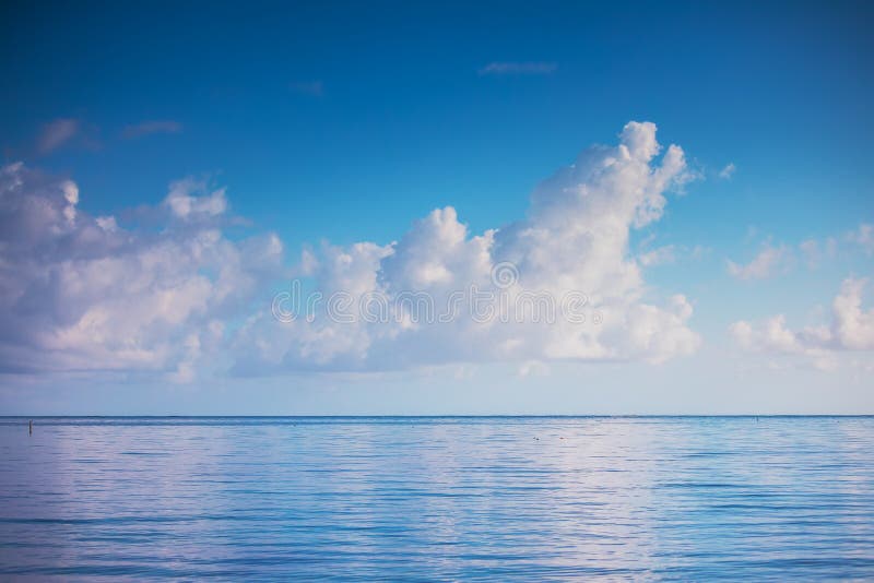 Cloudscape over the sea stock photo. Image of cloudy - 180748234