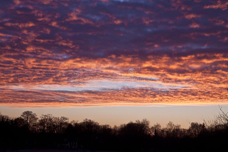 Cloudscape and red sunrise stock photo. Image of silhouette - 90644016