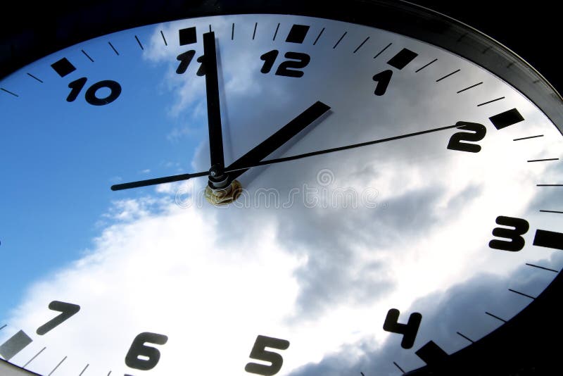 Cloudscape Reflected on Clock Stock Image - Image of angle, clouds ...