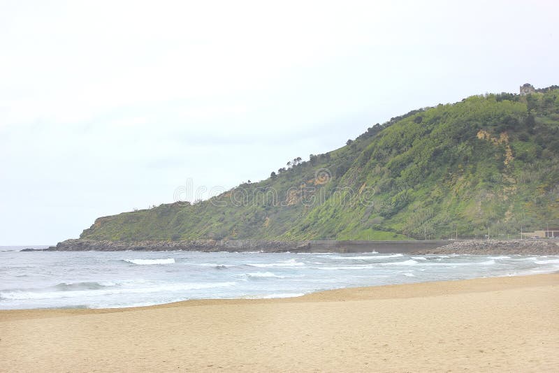 Cloudy beach day stock photo. Image of wave, stormy, nature - 50374686