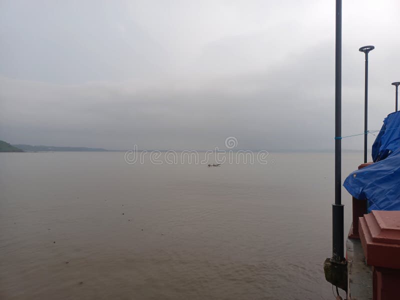 Cloudy beach in Goa India stock photo. Image of horizon - 255273406