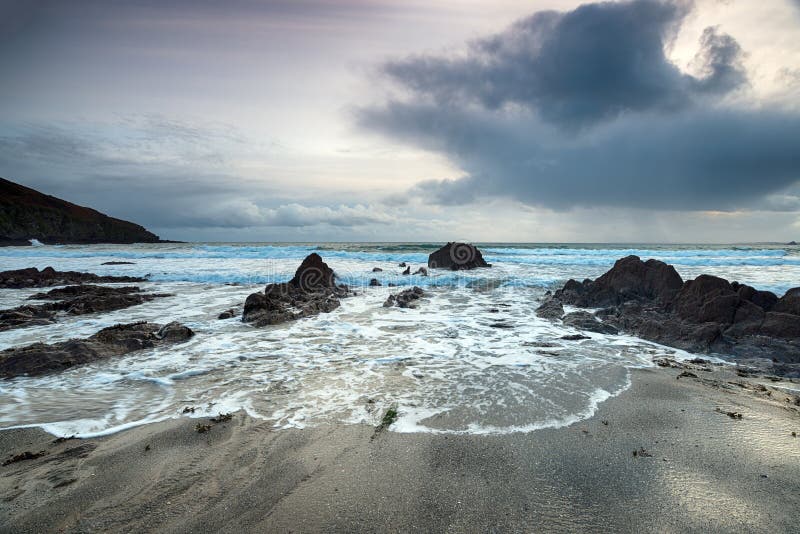 Cloudy Beach Scene stock image. Image of british, cloudy - 63149093