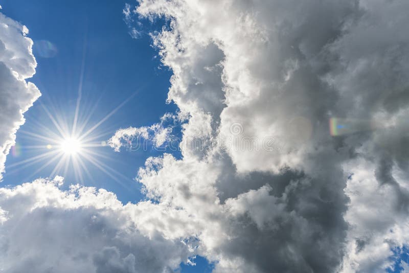 Cloudy Blue Sky As Background. Direct Sunlight, Sun Above the Clouds ...