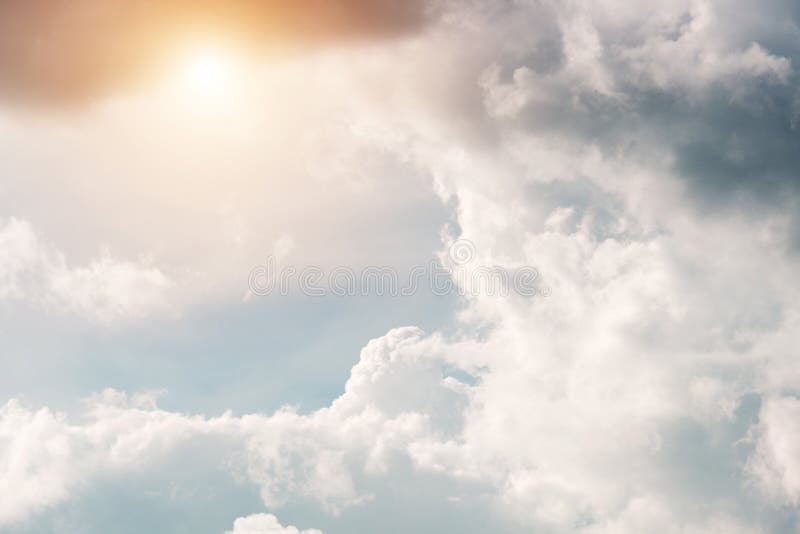 Cloudy in the Bright Blue Sky with the Sun Light that Passes through ...