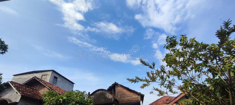Cloudy Clear Sky in Front of the House Stock Image - Image of landmark ...