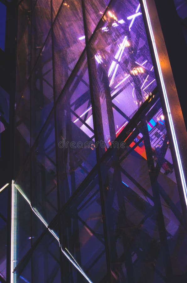 Synthwave Colors on a Glass Wall of a House with Raindrops Stock Image ...
