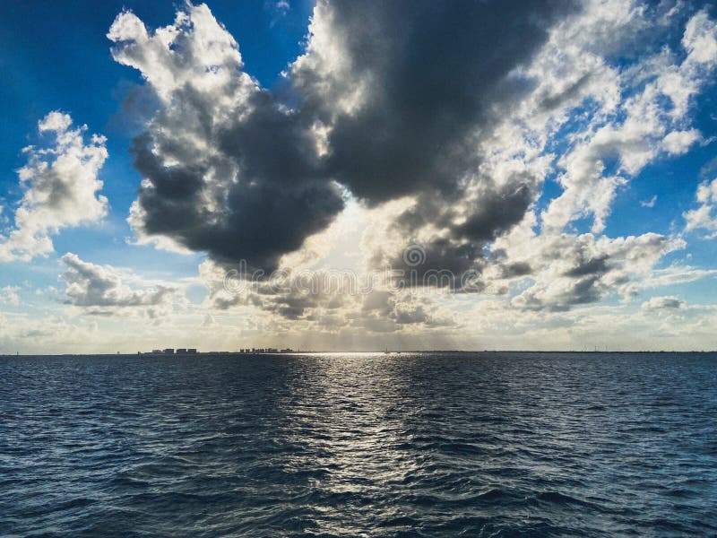 A cloudy day in Cancun stock image. Image of reflection - 274023415