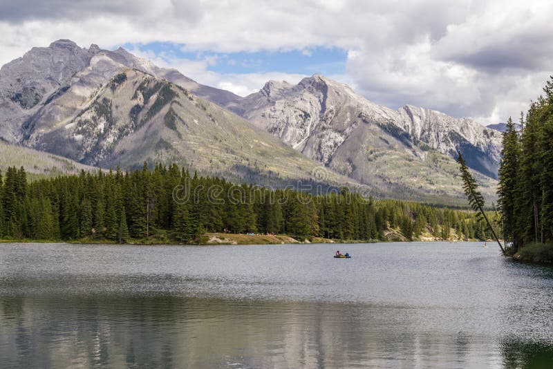 Cloudy Day at Johnson Lake Surface - Banff Alberta Stock Image - Image ...