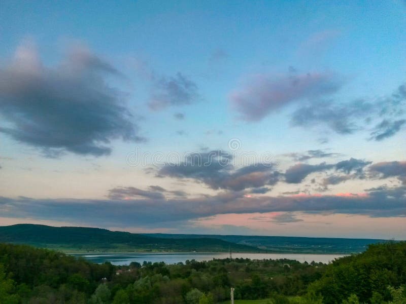 Cloudy Day at the Lake. Water Reflecting Clouds Stock Photo - Image of ...