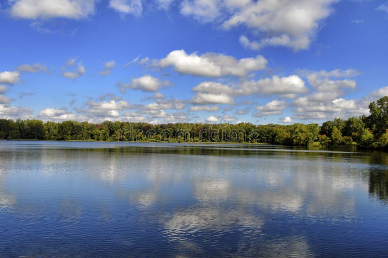 Cloudy Day stock image. Image of lake, reflections, cloudy - 33974085