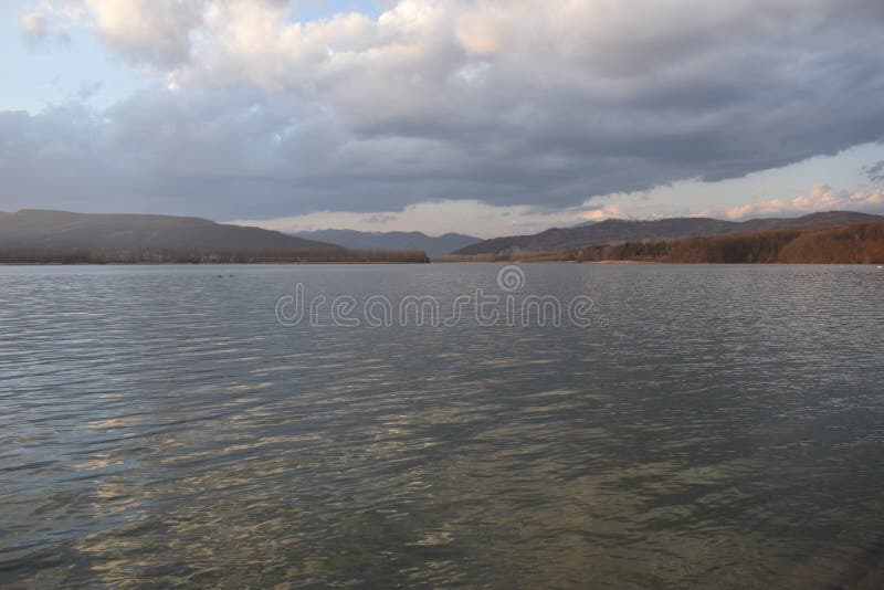 Cloudy day over the lake stock image. Image of cloudy - 174141255