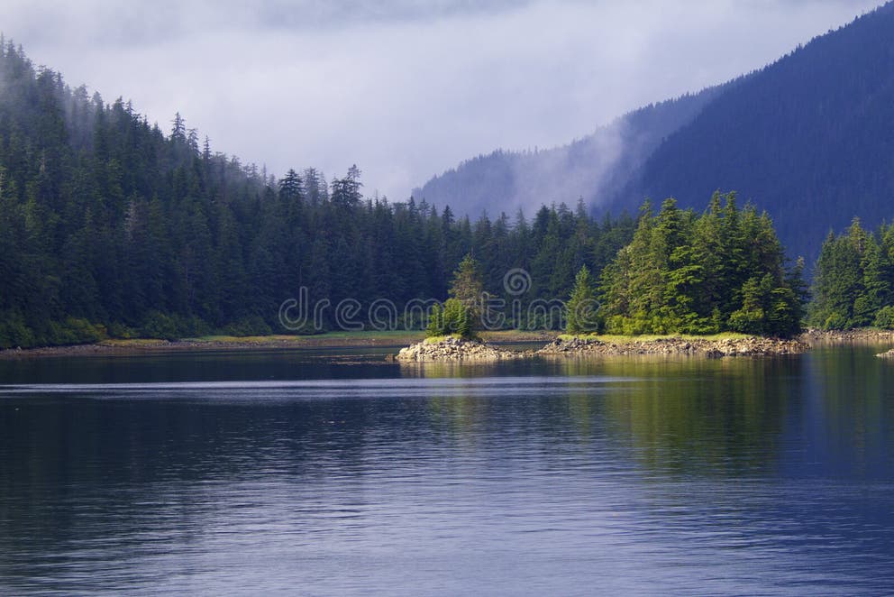 Cloudy Forest Peril Strait 842877 Stock Photo - Image of scenic, forest ...