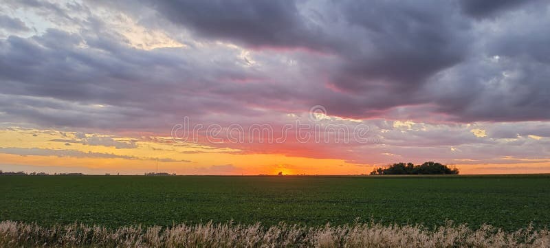 Cloudy Friday Sunset stock photo. Image of prairie, plain - 227387754